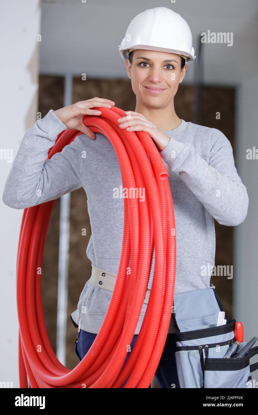 female engineer checking pipes in a construction site Stock Photo - Alamy
