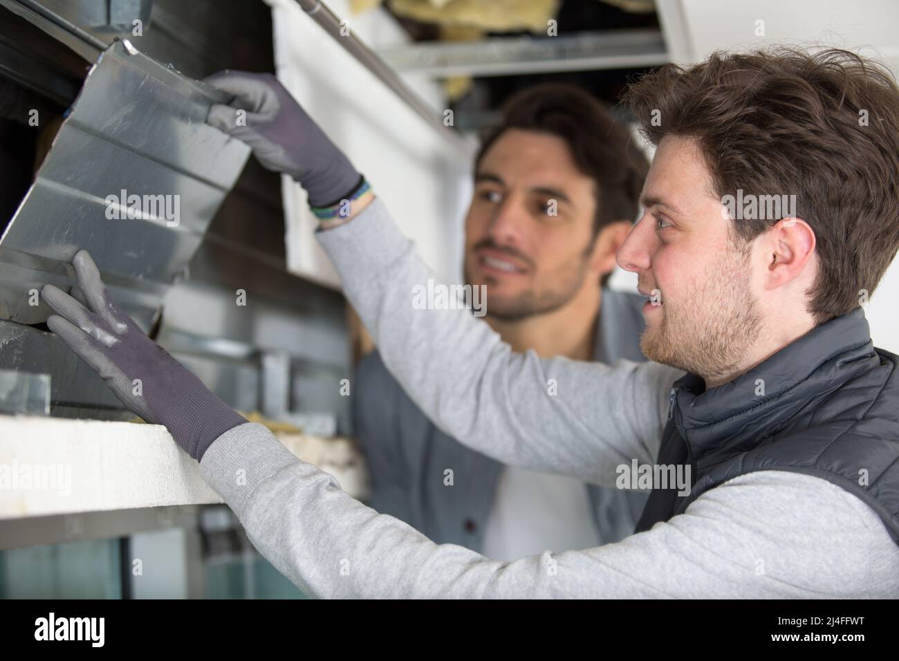 concept of windows installation workers Stock Photo - Alamy