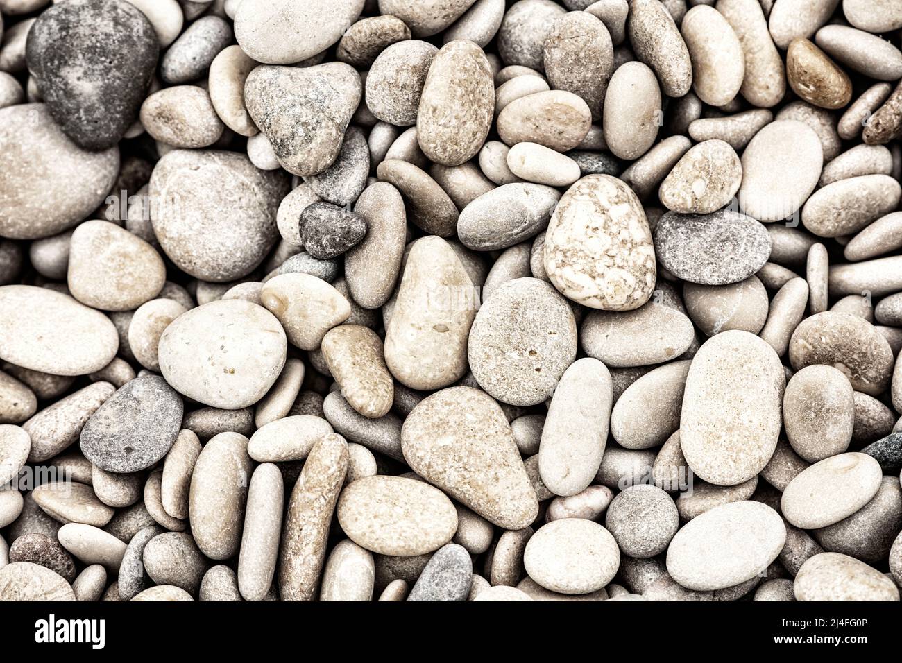Random patterns in nature, small beach pebbles on the Costa Blanca ...