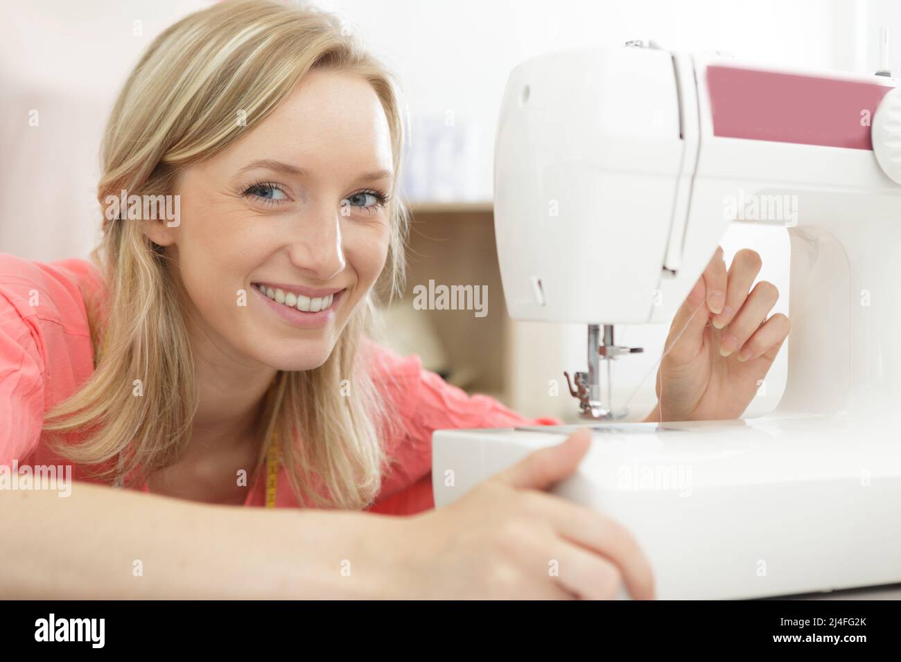 Woman threading hi-res stock photography and images - Alamy