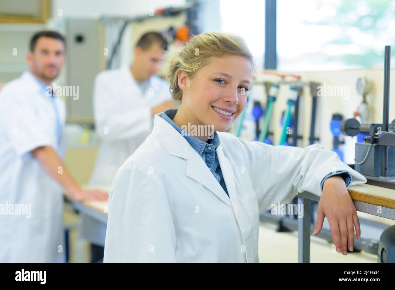 Blonde young woman in scientist hi-res stock photography and images - Alamy