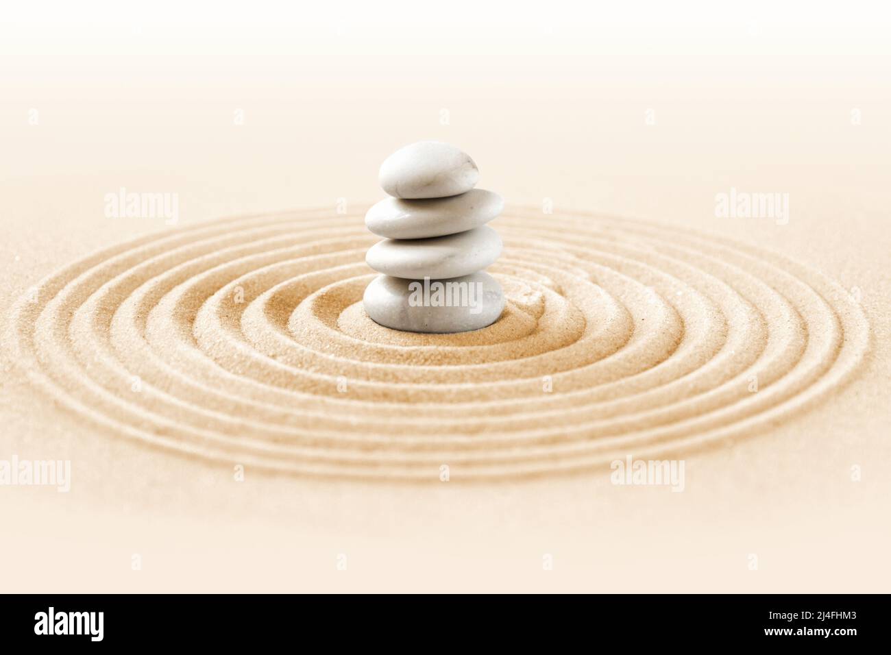 White stones pile in the sand. Zen japanese garden background scene ...