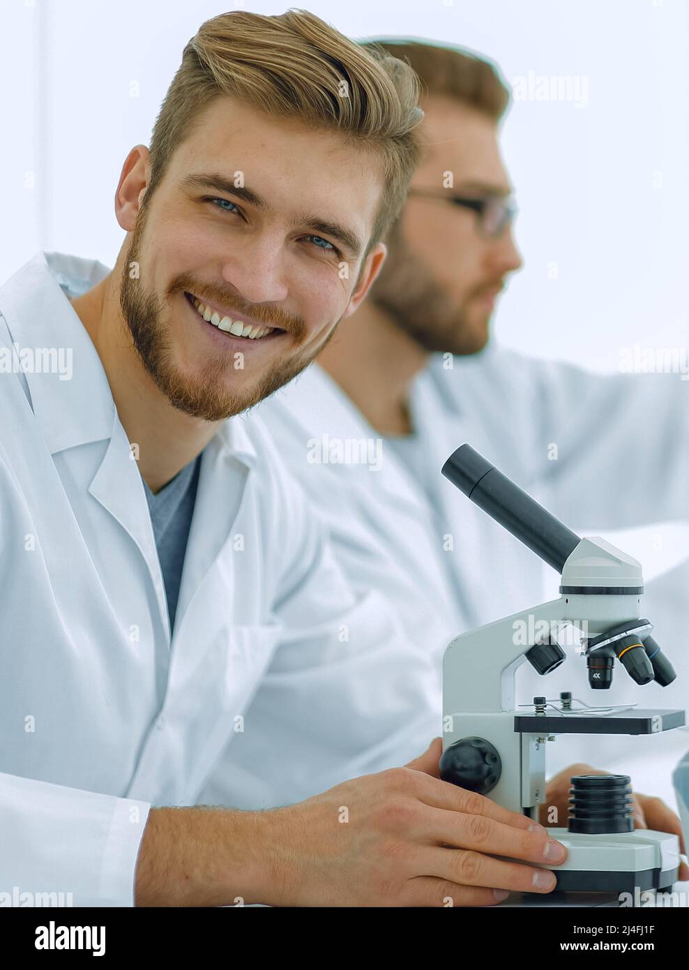 male researcher carrying out scientific research in a lab Stock Photo ...