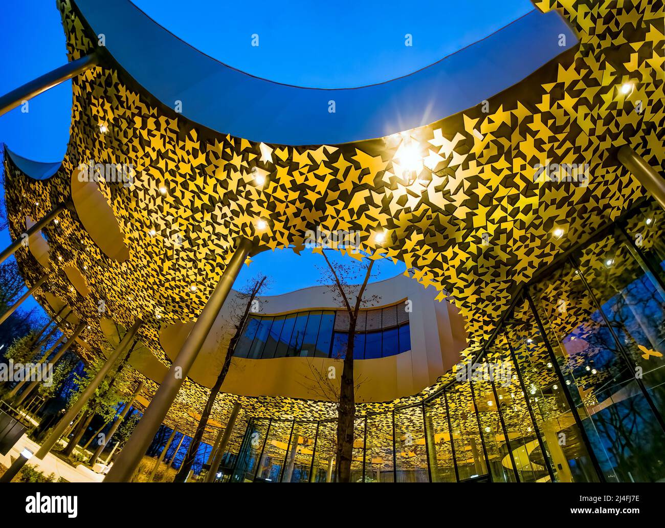 Night view of the iconic House of Music Hungary.The building designed ...