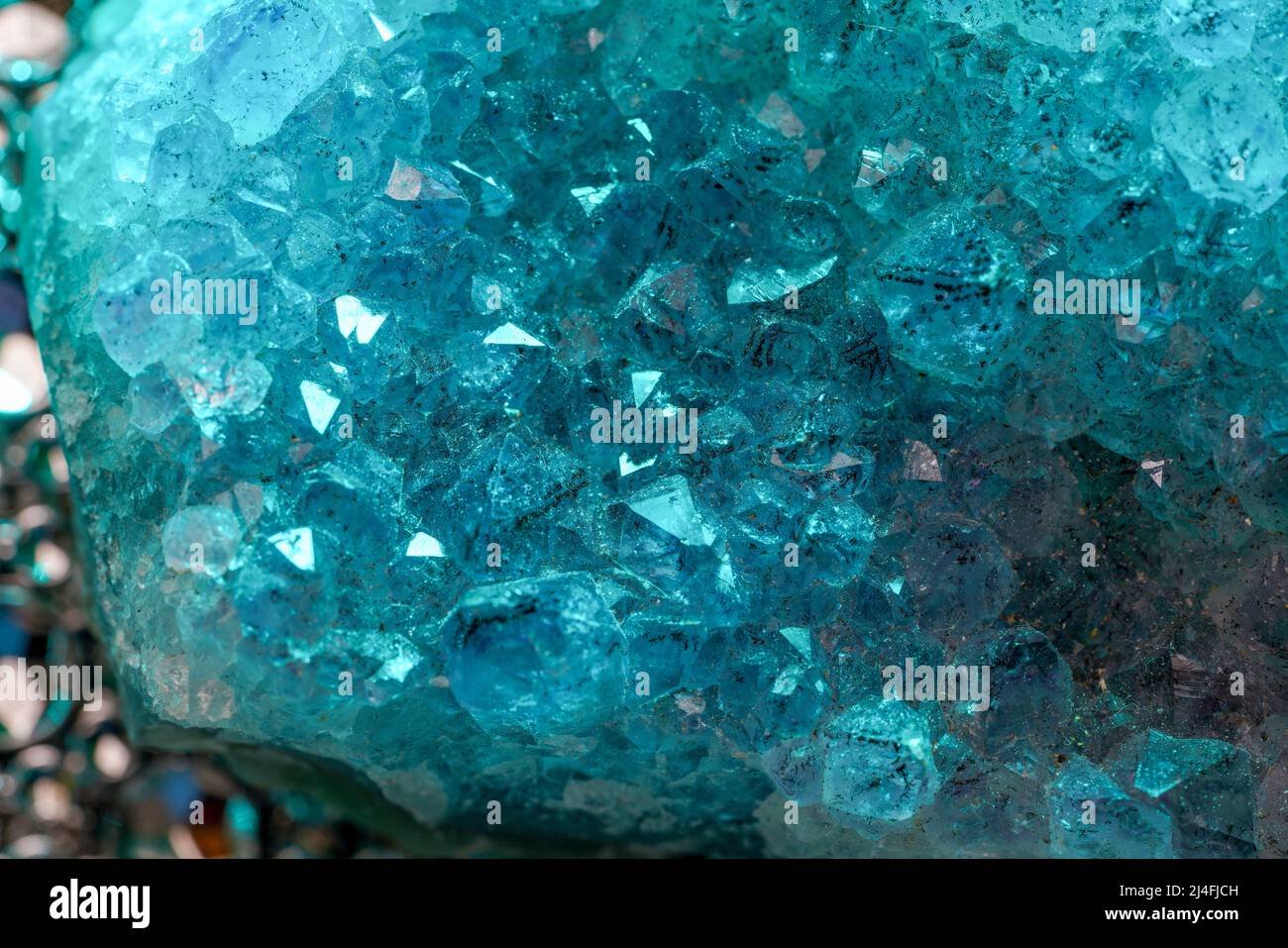 Quartz with mineral inclusions in the studio in front of a background ...