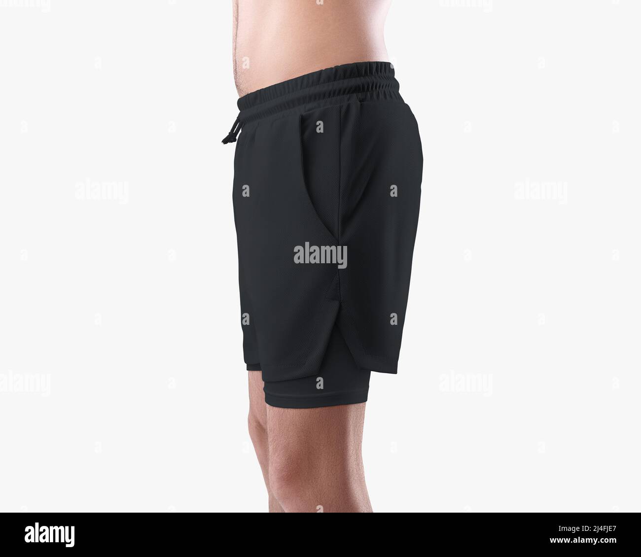 Mockup of black men's loose shorts with compression lining, training ...