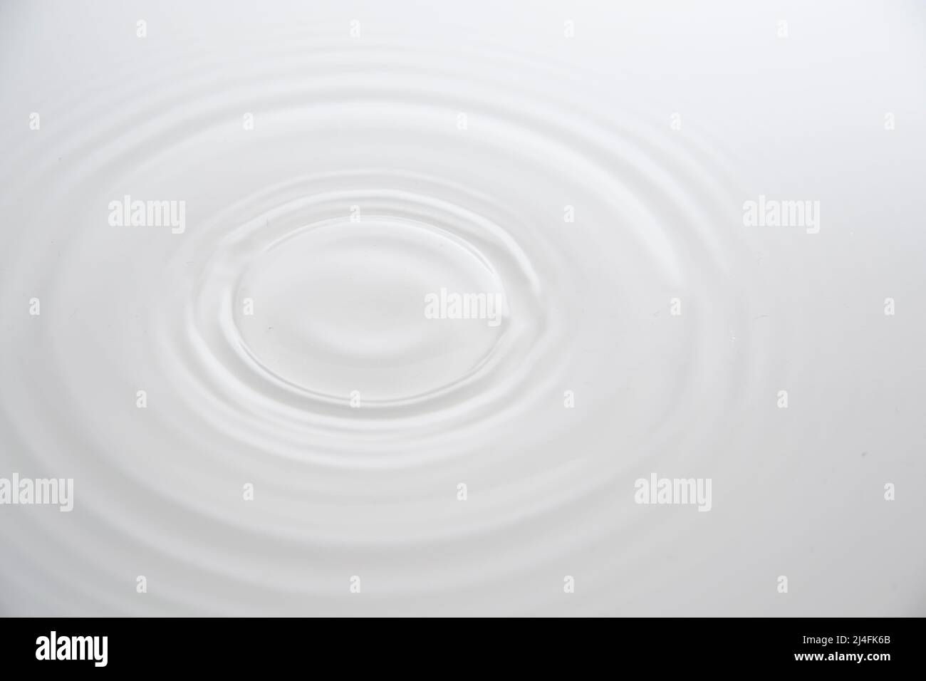 water drop and splash and white background Stock Photo - Alamy