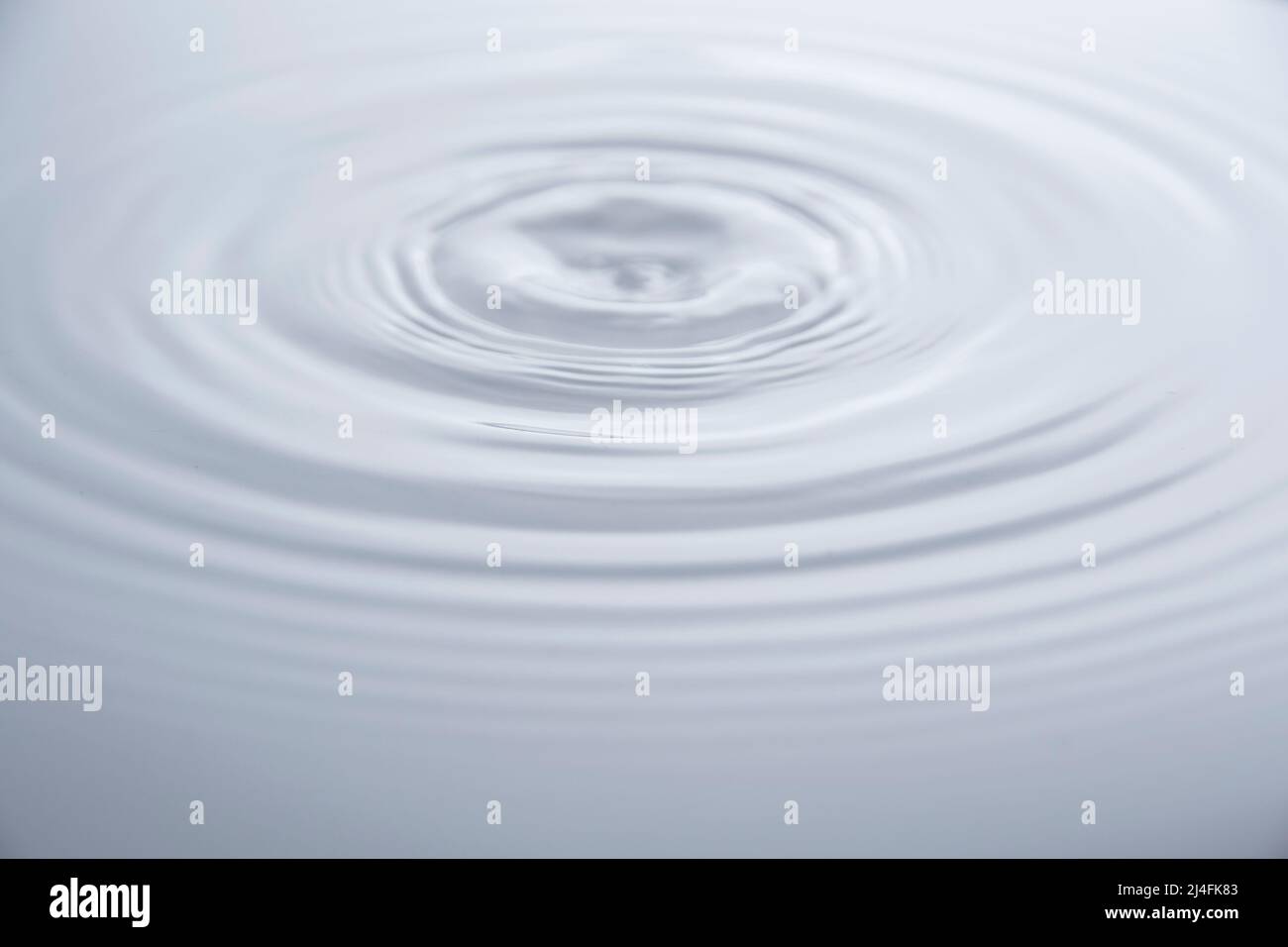 water drop and splash and white background Stock Photo - Alamy