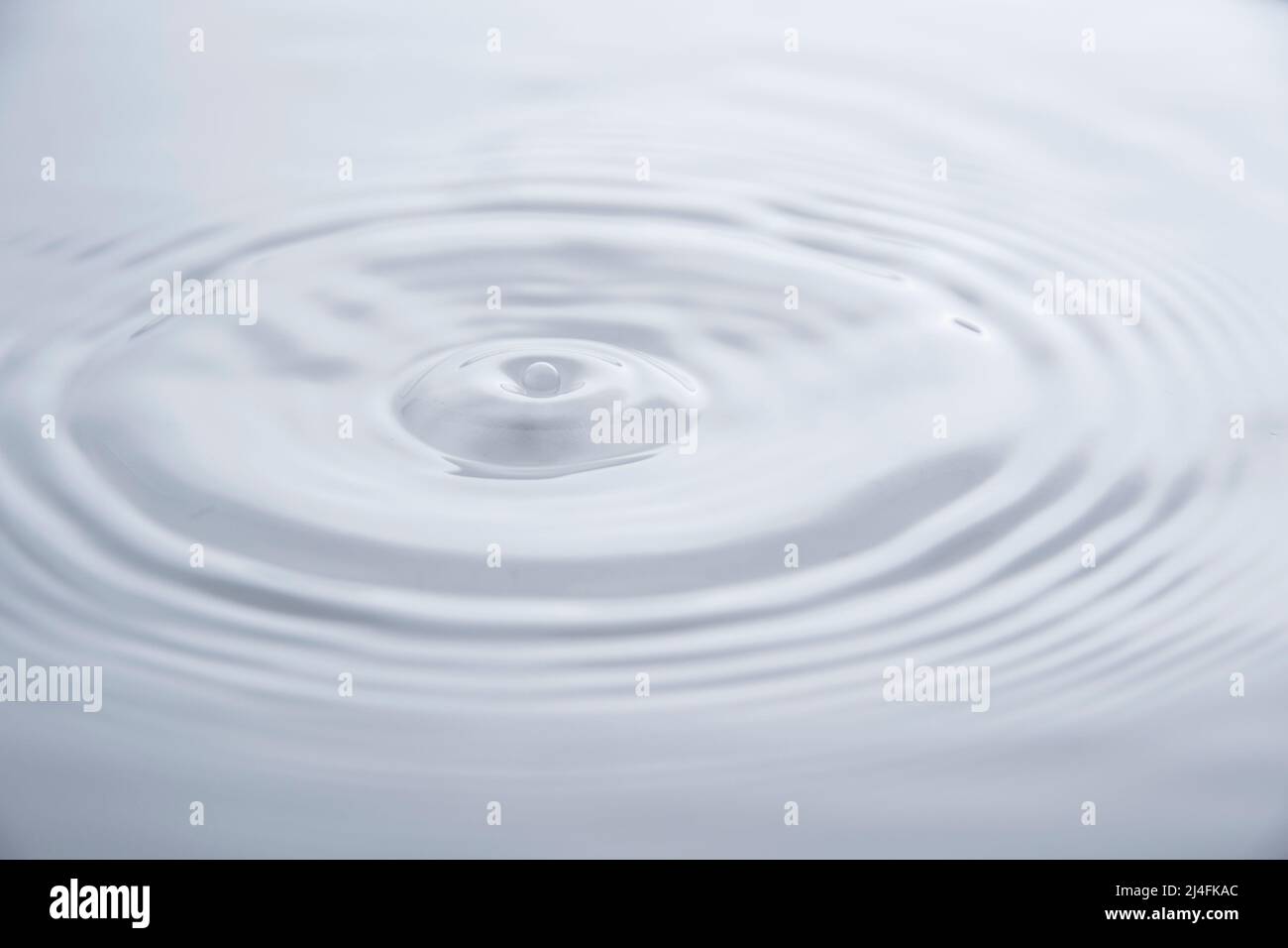 water drop and splash and white background Stock Photo - Alamy