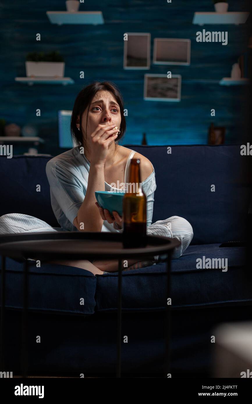 Woman popcorn mess hi-res stock photography and images - Alamy