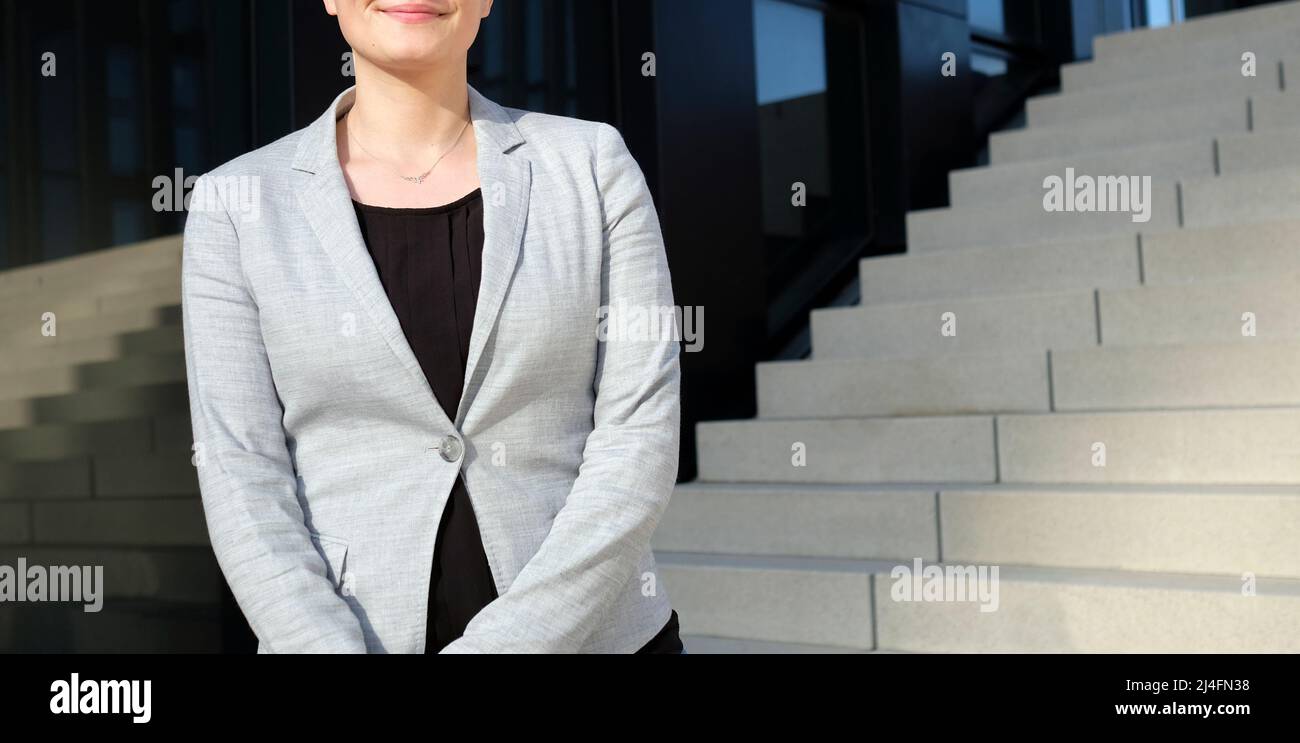 Female professional wearing suit hi-res stock photography and images ...