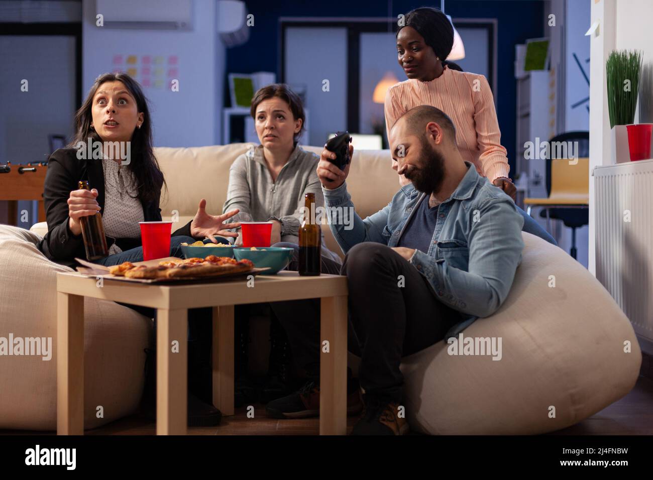 Sad man losing video games play online with controller on tv console at ...
