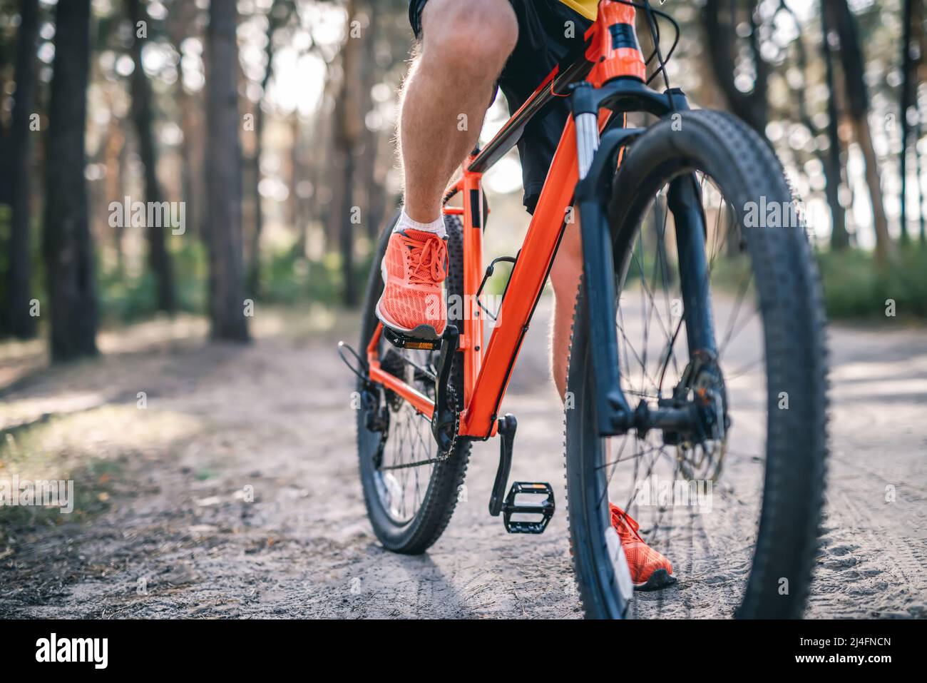 Sneaker man riding bike hi-res stock photography and images - Alamy