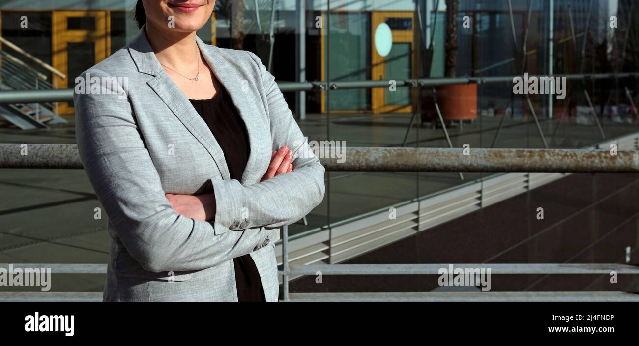 Female professional wearing suit hi-res stock photography and images ...