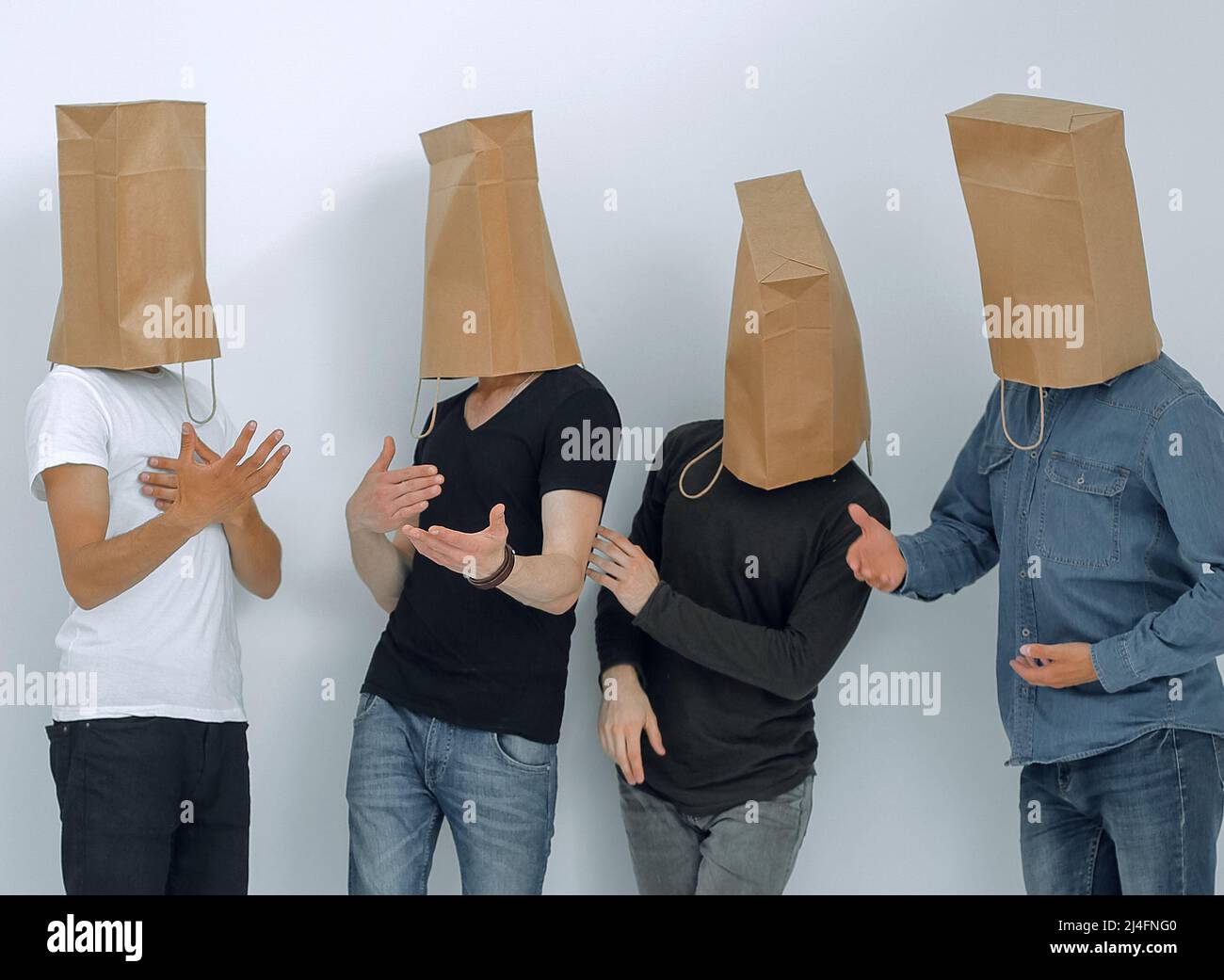 group of young people with paper bags on their heads Stock Photo - Alamy