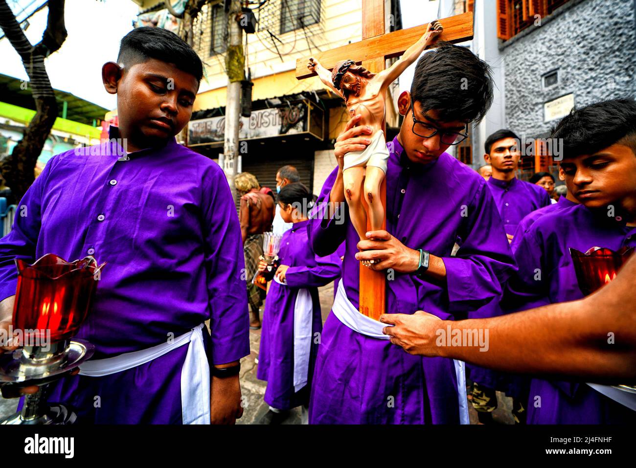 Christian youths and devotees seen carrying a cross outside of Missionaries of Charity as they ...