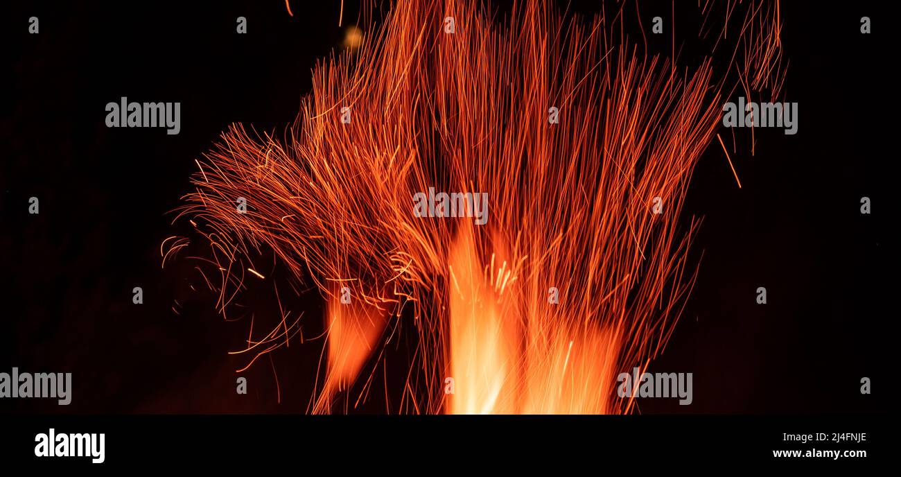 Beautiful red orange stripes of fire flame isolated on black background ...