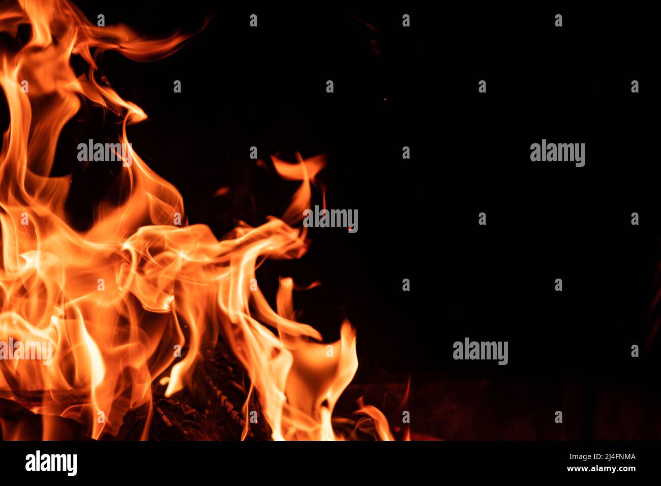 Beautiful orange red fire flame isolated on black background. Fiery ...