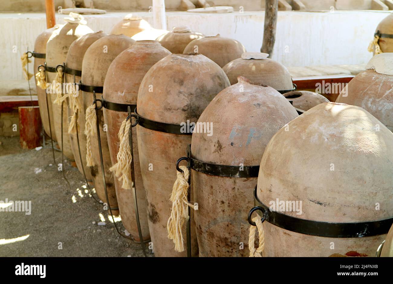 Row of Amphoras Used in the Productions of Peruvian Pisco Brandy at the ...