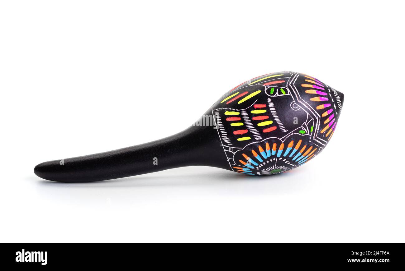 Painted maracas lying on white Stock Photo - Alamy