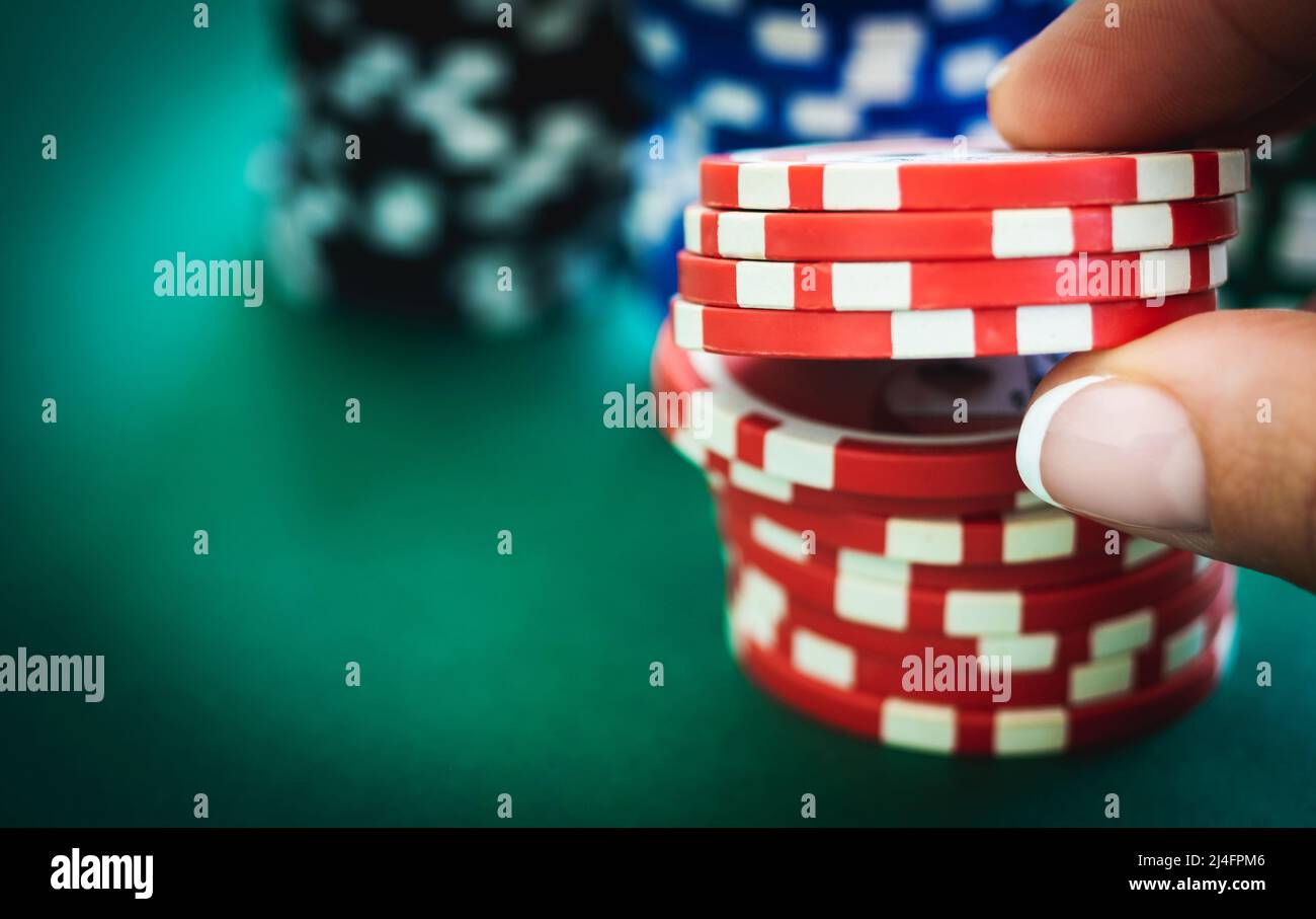 Gambler hand hi-res stock photography and images - Alamy