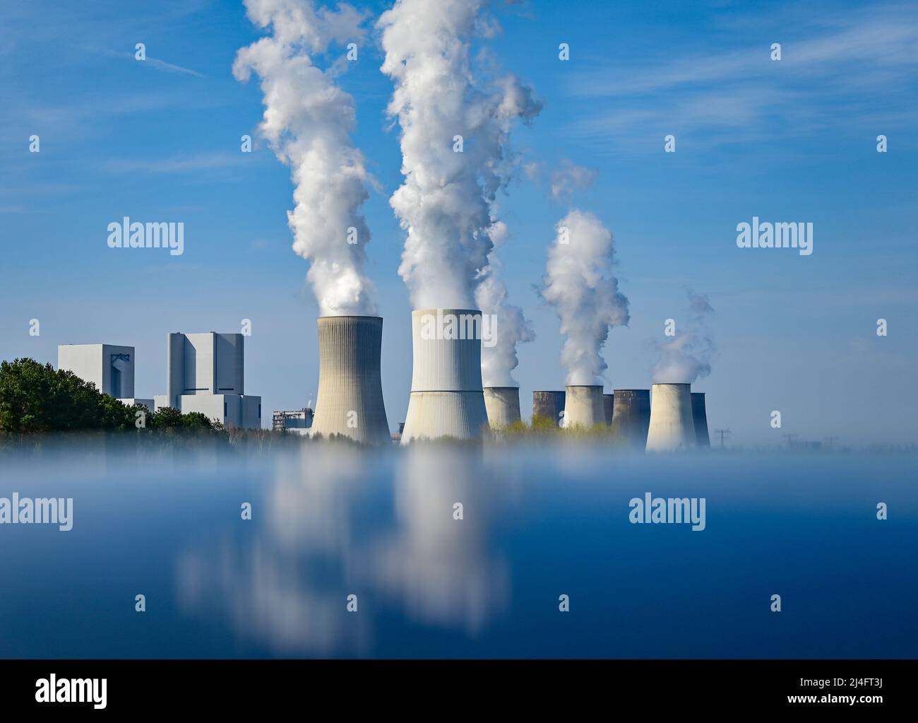 Boxberg, Germany. 14th Apr, 2022. Steam rises from the cooling towers ...