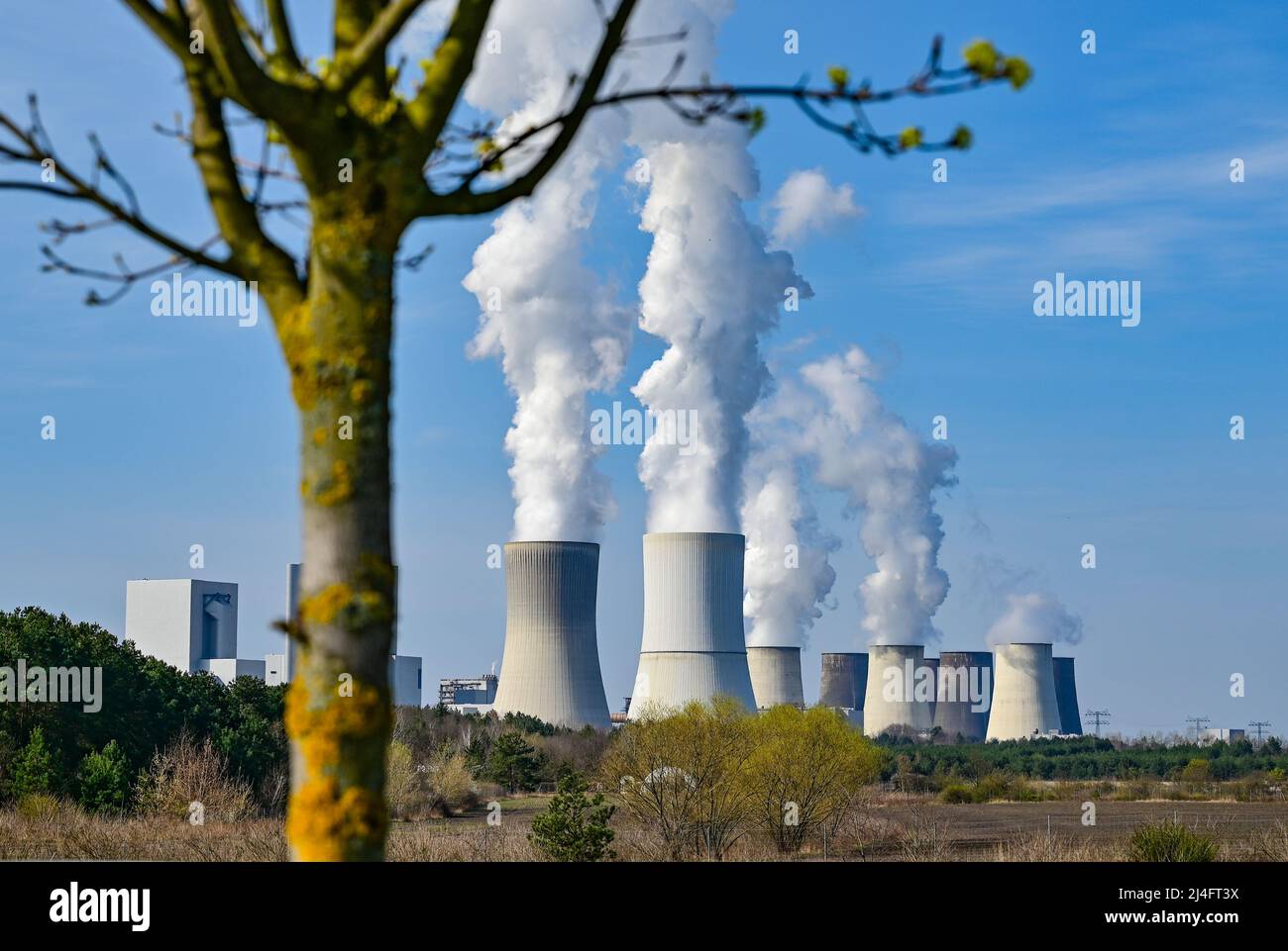 Boxberg, Germany. 14th Apr, 2022. Steam rises from the cooling towers ...