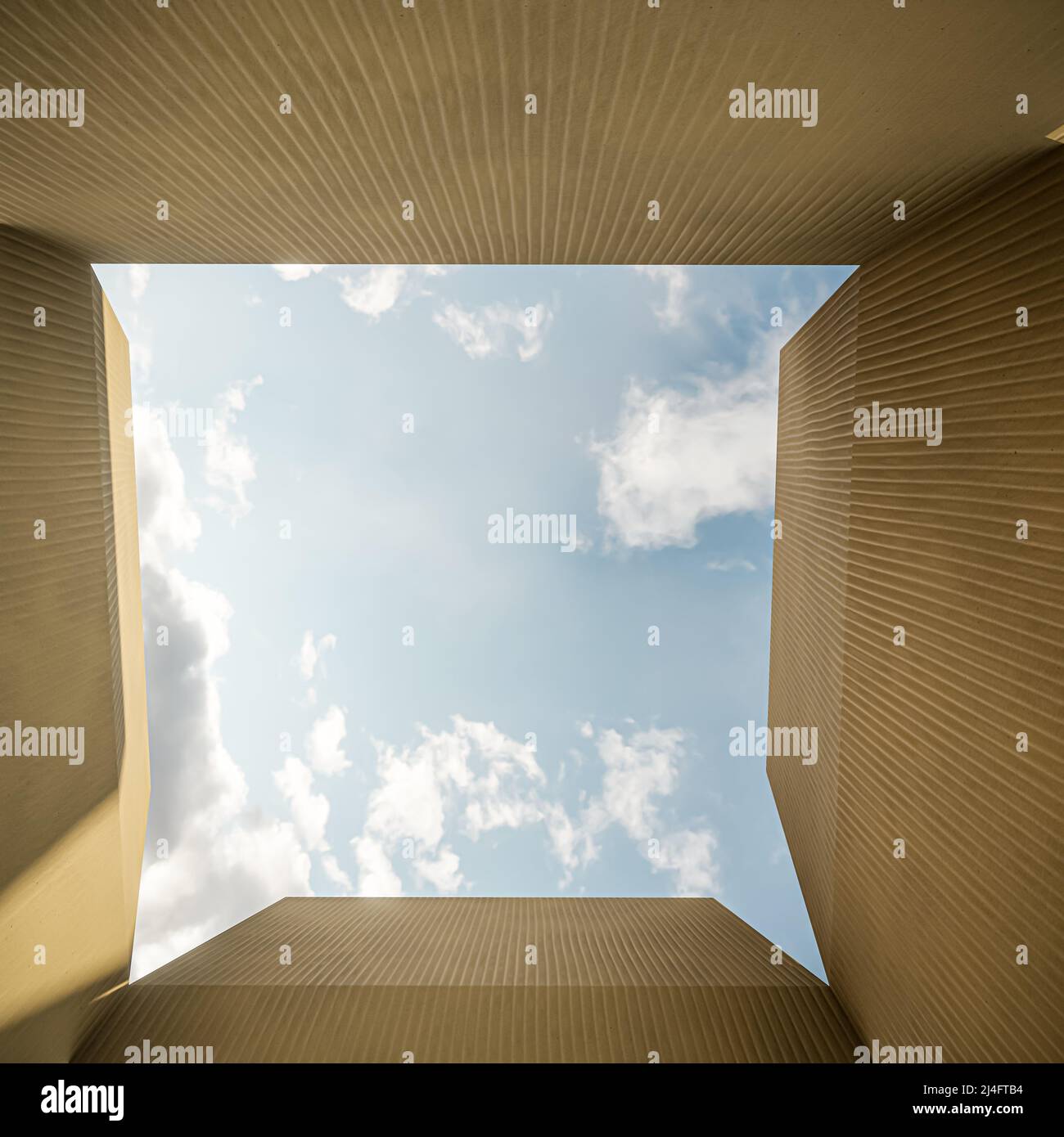 3d illustration of an empty cardboard box below cloudy sky Stock Photo ...