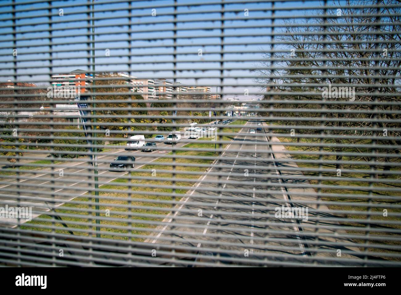 pedestrian overpass with anti-fall protection grid. Particular urban ...