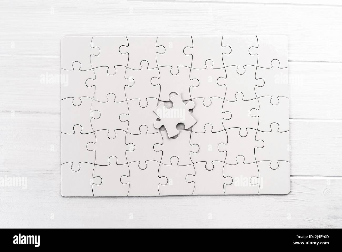 White jigsaw puzzle Stock Photo - Alamy