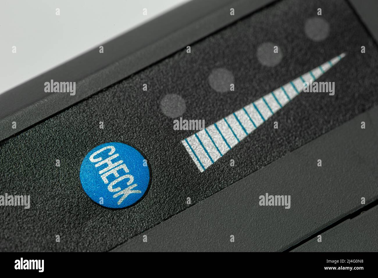 Top view of check button and charge level indicator LEDs on battery ...