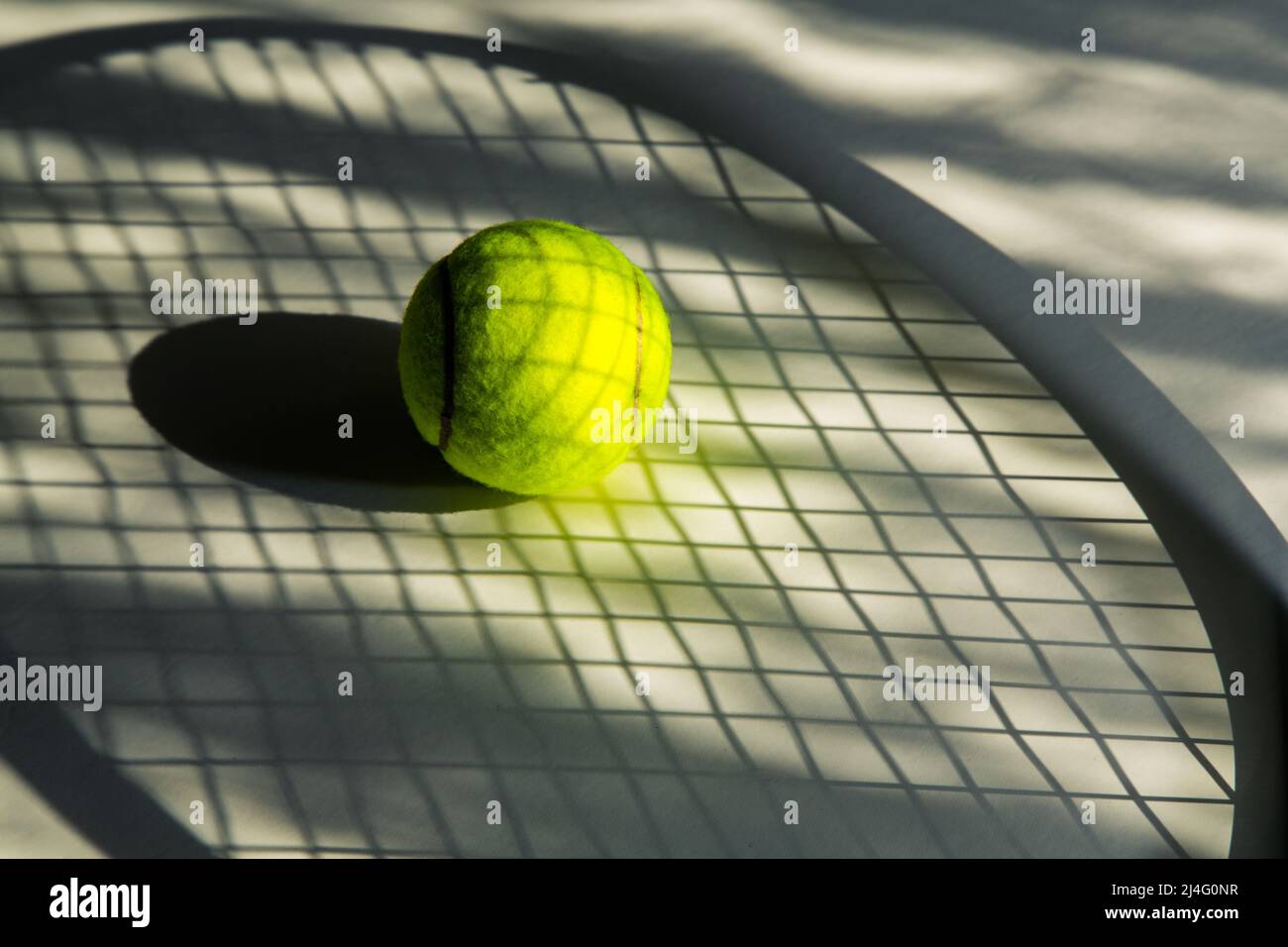 Tennis ball and its shadow on an isolated white background. Tennis ball ...