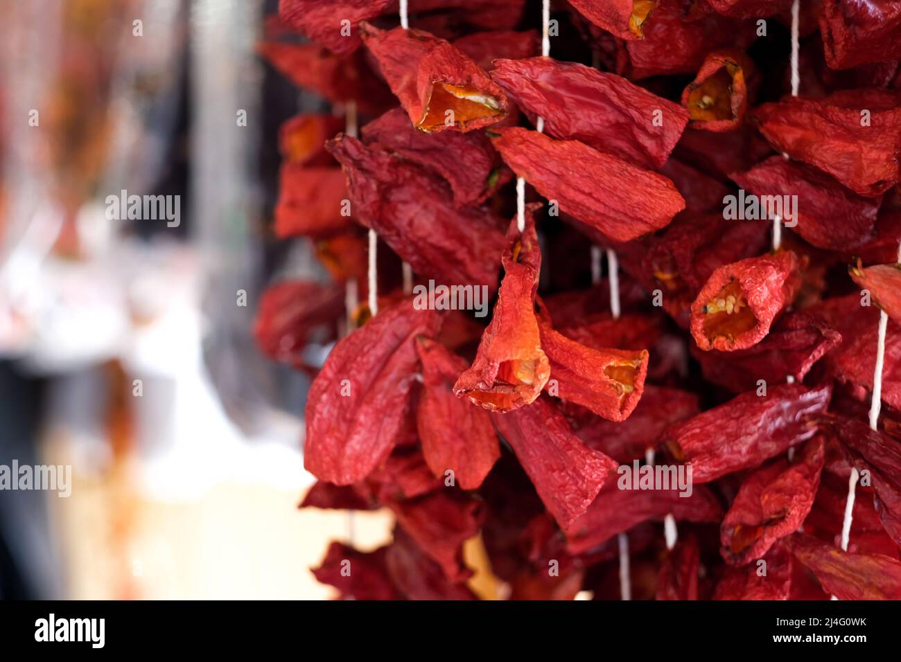 Dried paprika pepper pieces Stock Photo - Alamy