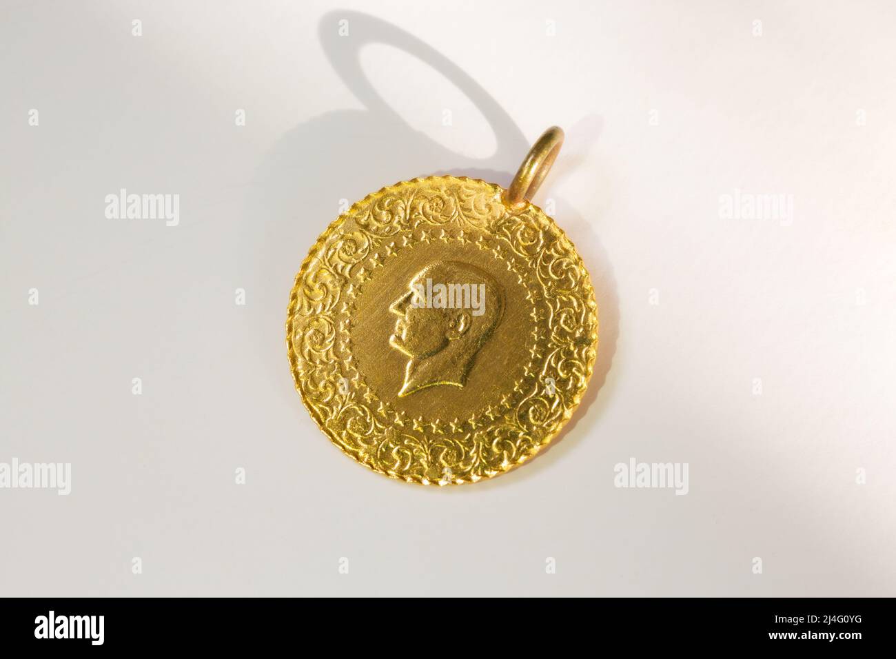 Top view of traditional Turkish gold coin on white isolated background ...