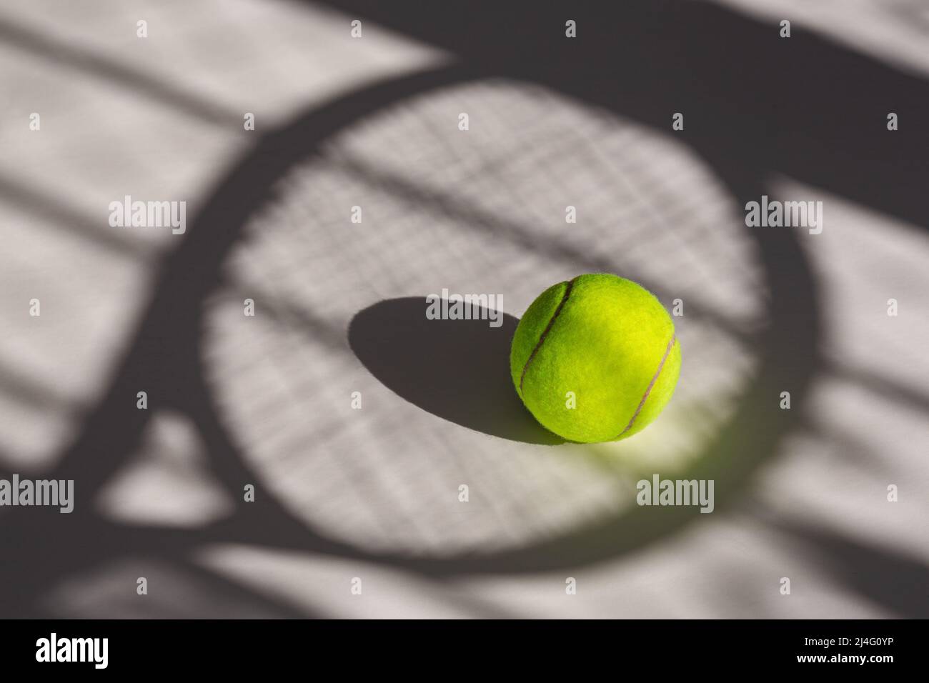 Tennis ball and its shadow on an isolated white background. Tennis ball ...