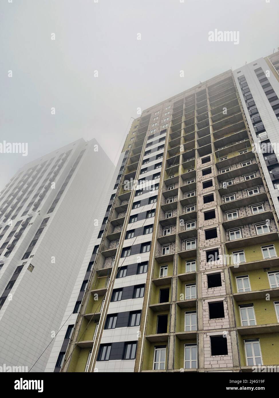 Facade of modern building in city. From below of constructing exterior ...