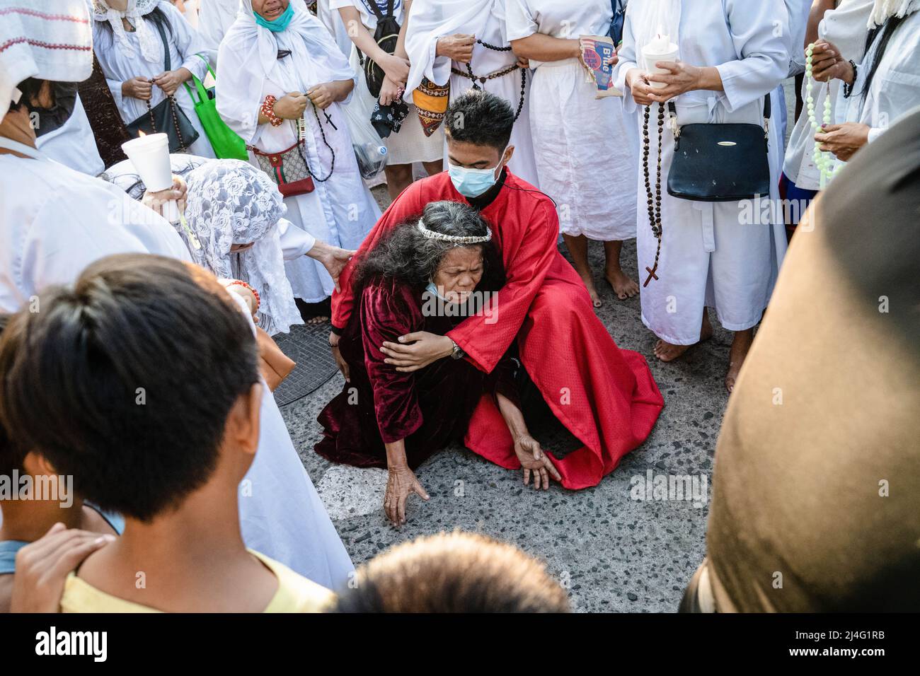 A woman collapses while undergoing a public display of penitence during ...