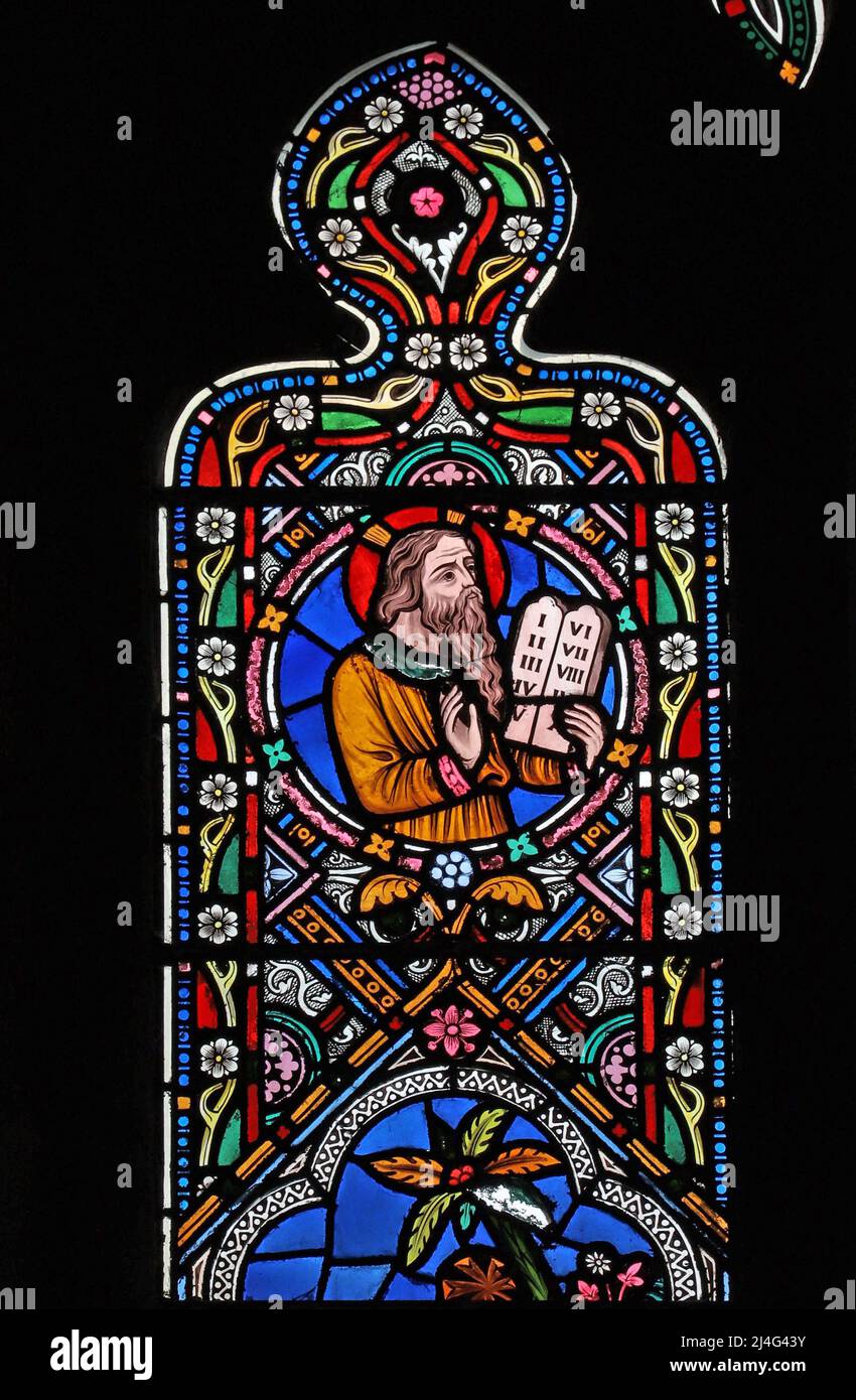 A stained glass window by Frederick Preedy depicting Moses with the ...