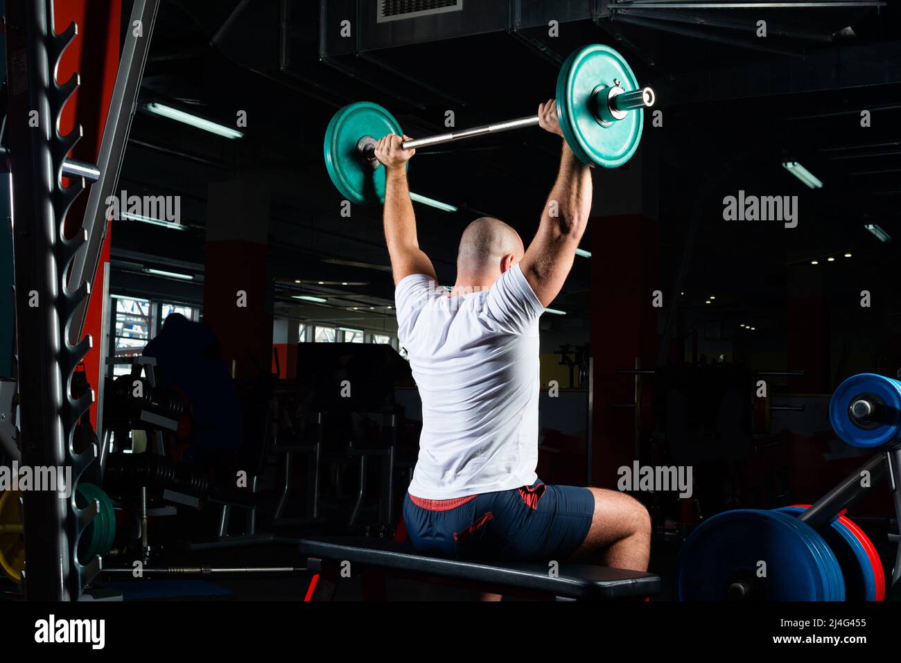 Young athlete lifts heavy barbell hi-res stock photography and images ...