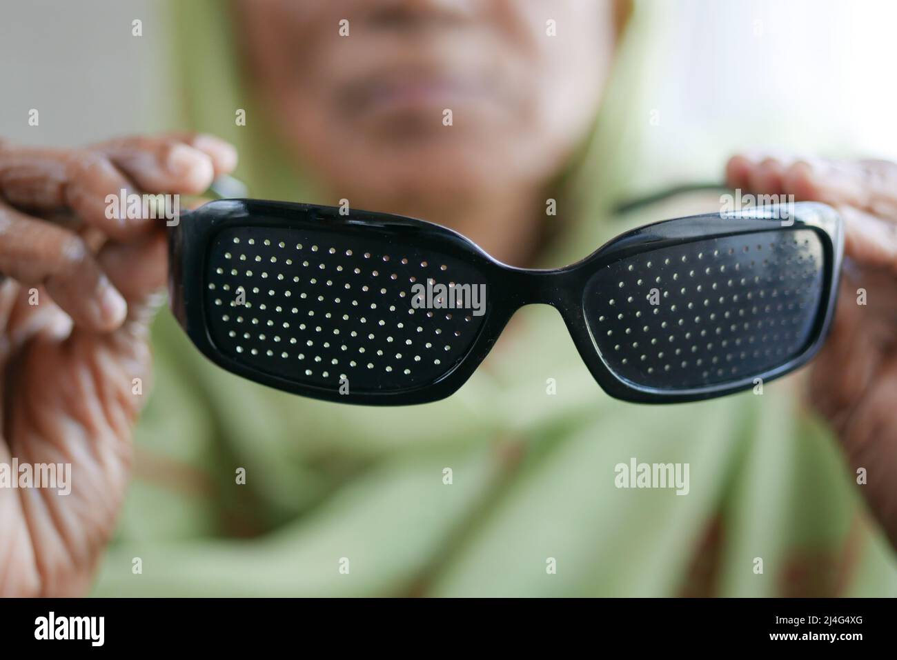 Eye perforation hi-res stock photography and images - Alamy