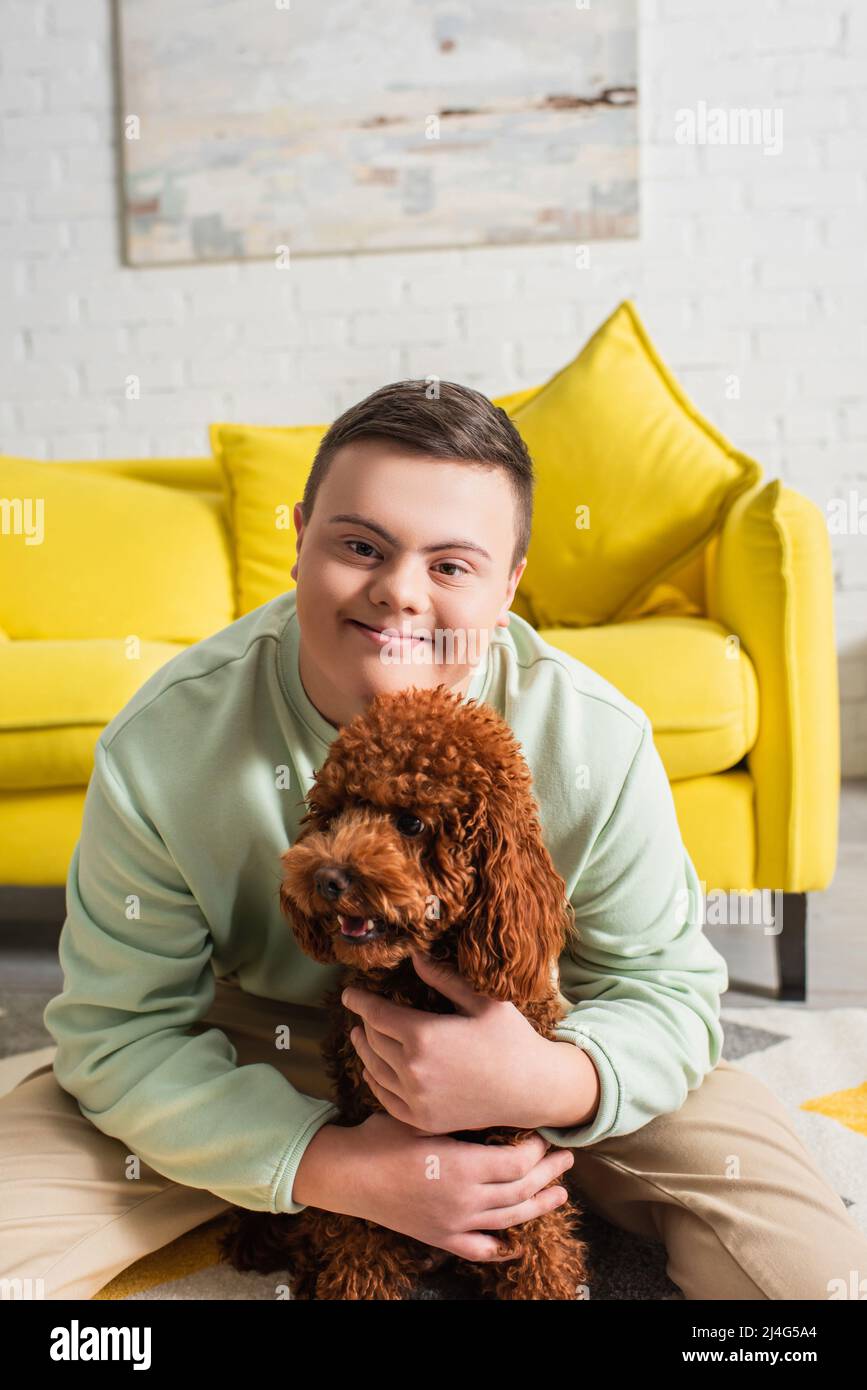 Caucasian teenager hugging dog hi-res stock photography and images - Alamy