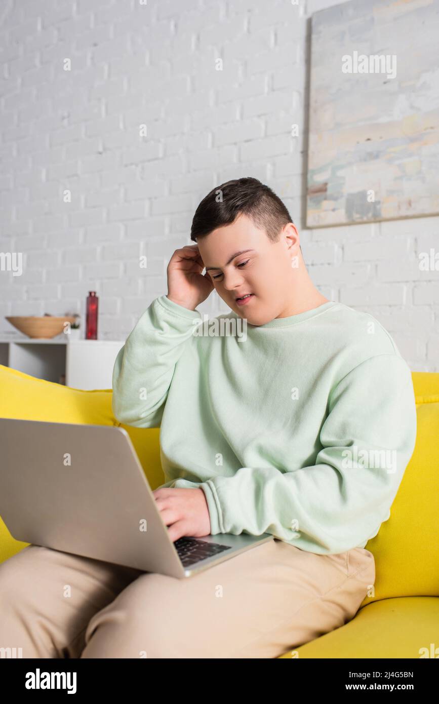 Down syndrome girl with computer hi-res stock photography and images ...