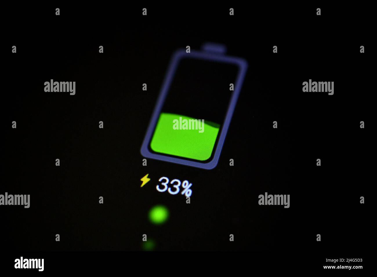 battery level indicator on a smartphone,black background,image of a ...