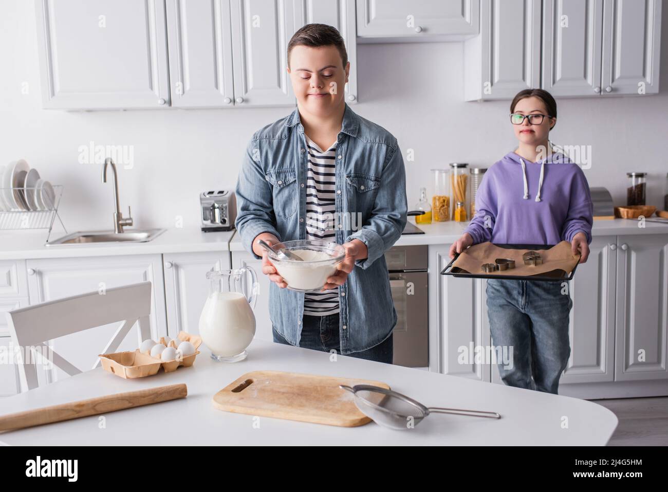 Down syndrome girl cook hi-res stock photography and images - Alamy