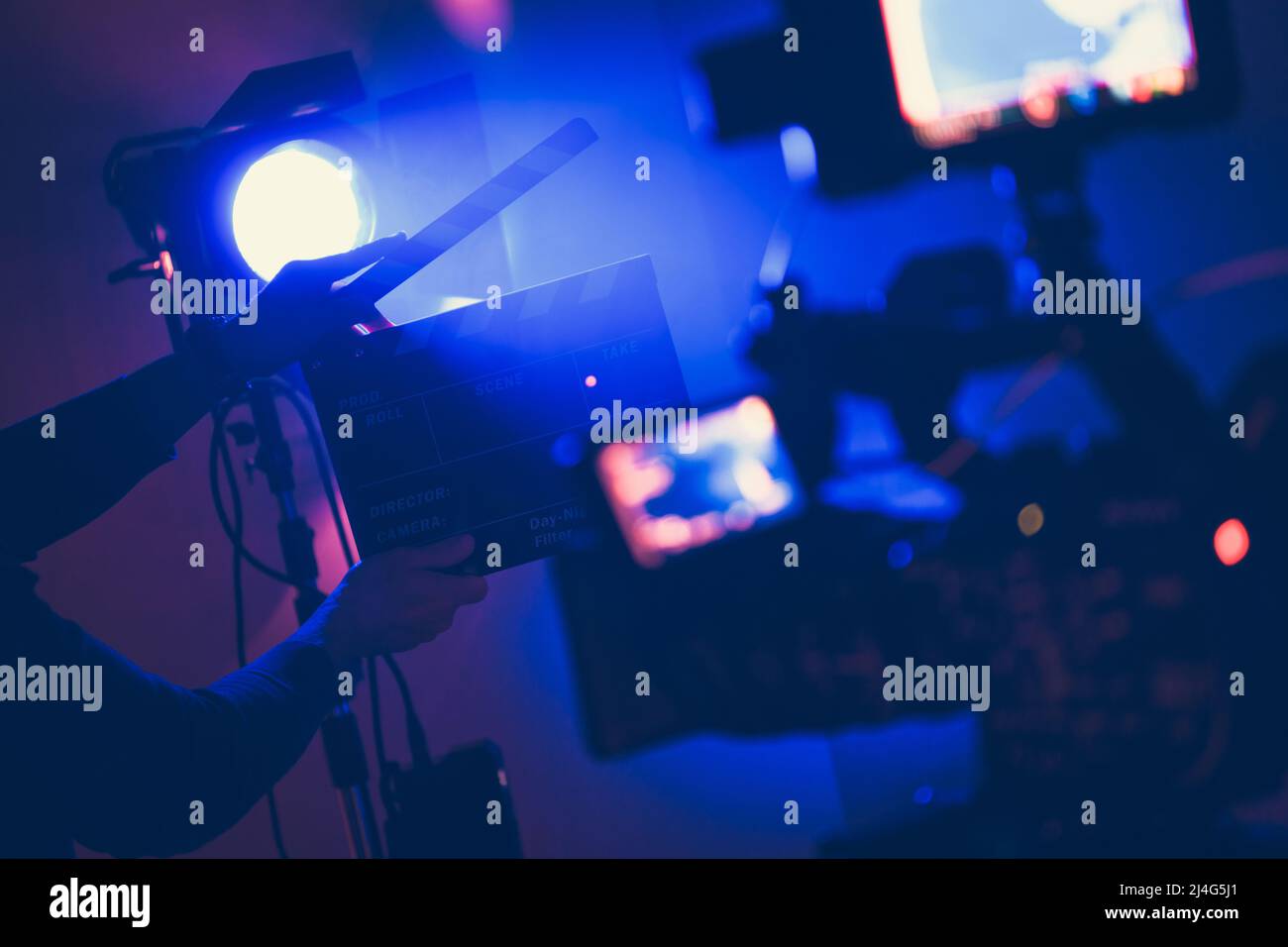 Modern Film Stage with Digital Camera and a Clapperboard. Motion ...