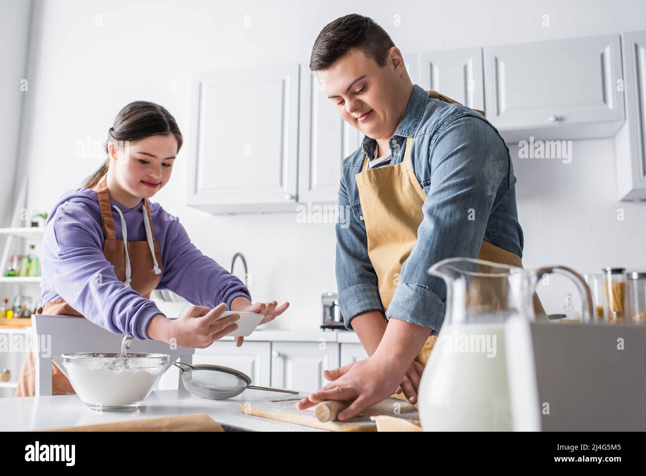 Down syndrome girl cook hi-res stock photography and images - Alamy