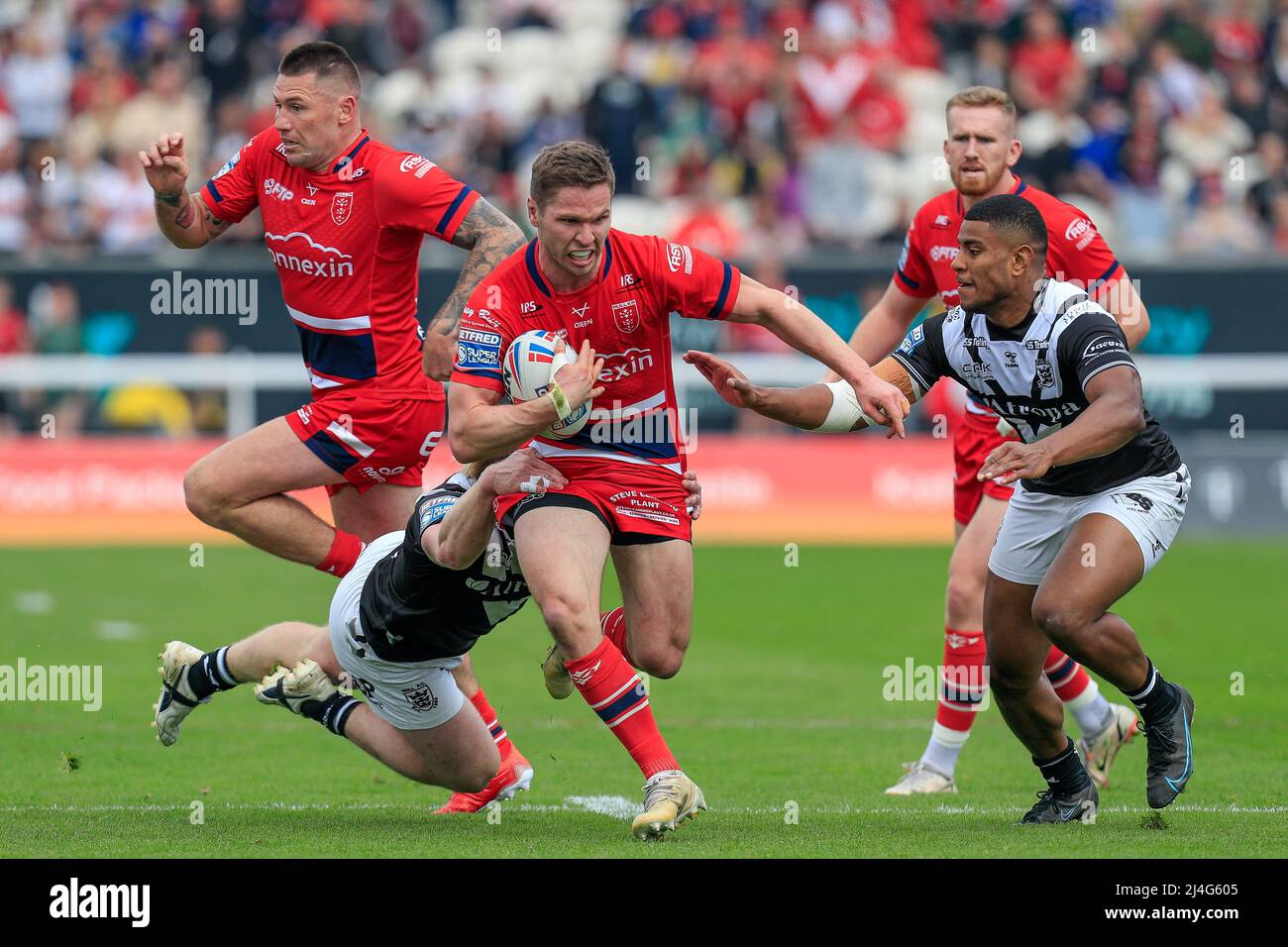 Matt Parcell (9) of Hull KR gets away from Jake Connor #1 of Hull FC ...