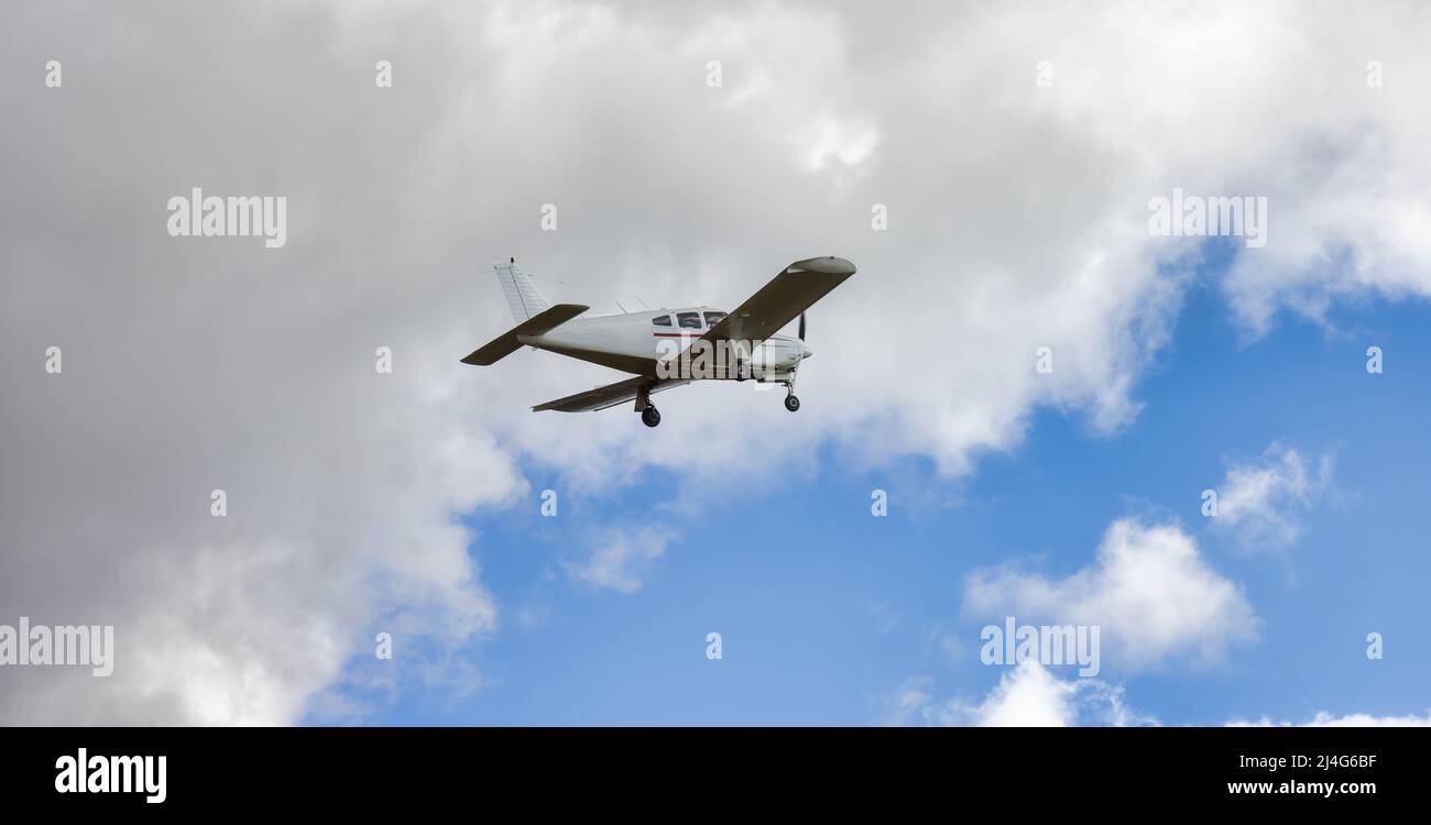 Single Engine Small Airplane taking off from an Airport Stock Photo - Alamy