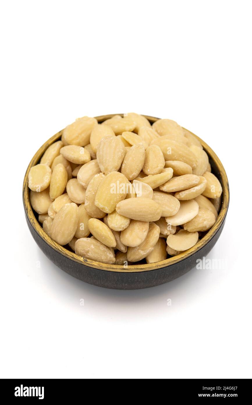 Peeled almond kernel isolated on white background. A bowl of almonds ...