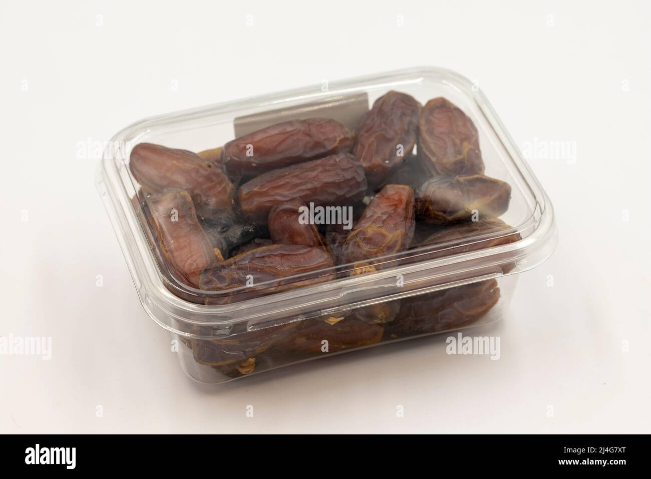 Packed date fruit on a white background. Packaged date fruit or Medjoul ...